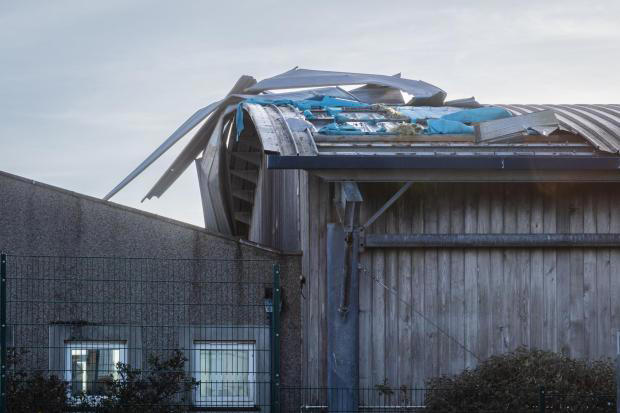 Storm rips hole in uninsured charity sports centre roof - now fight on ...