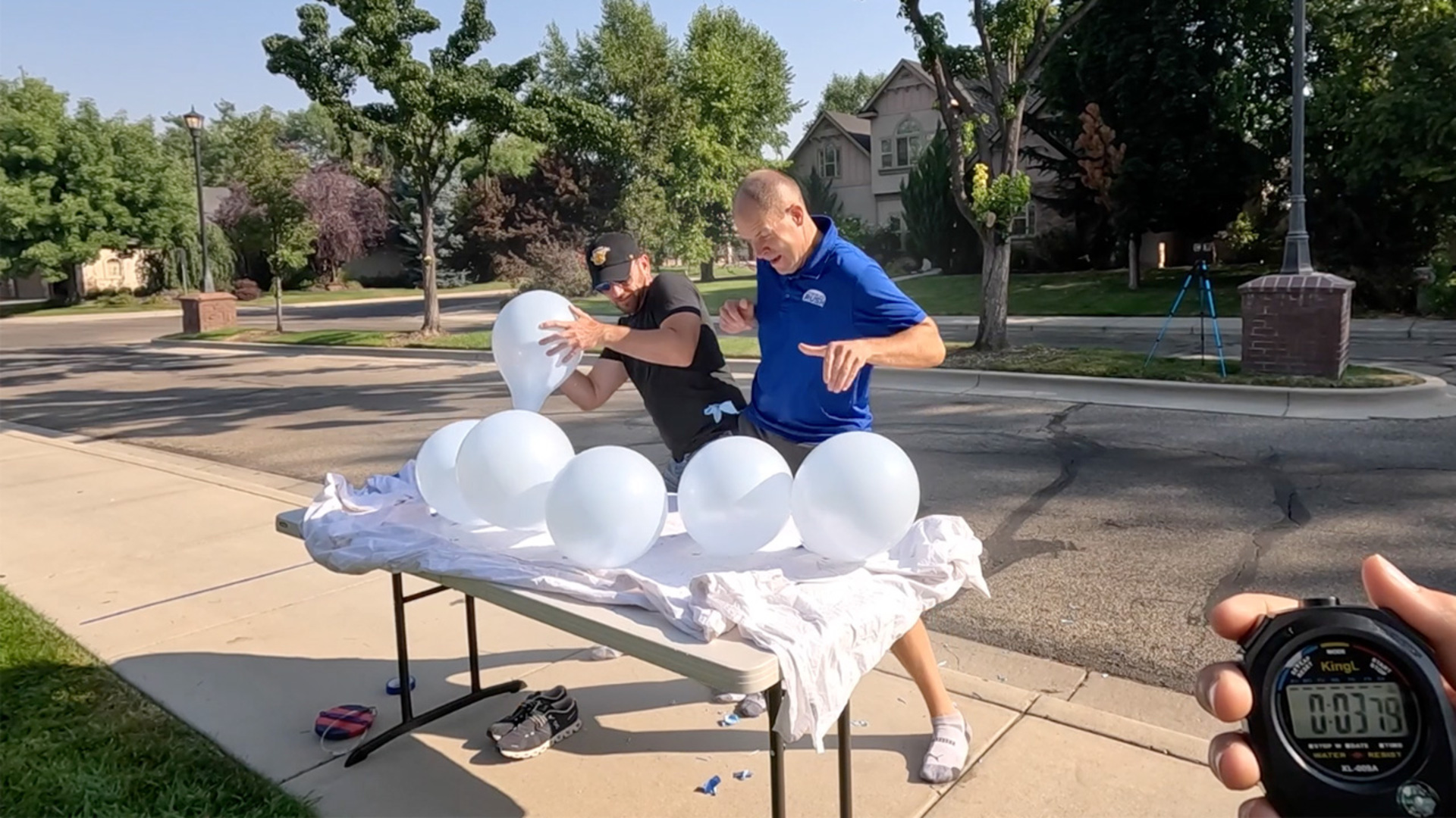 Fastest time to pop 10 balloons between two people 7.49 seconds by ...