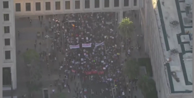 Thousands protest ICE with march through downtown Los Angeles