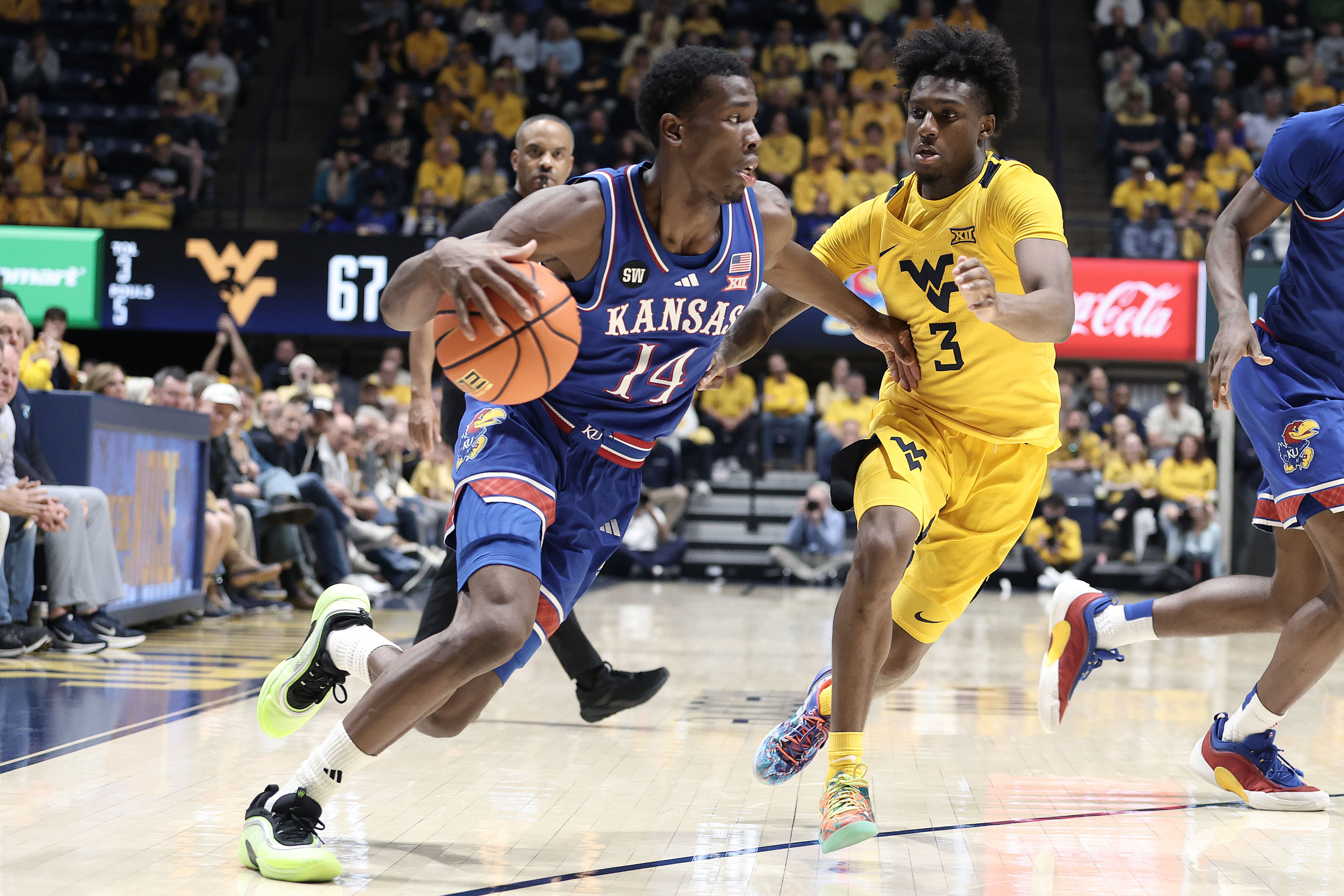 Honor Huff and Brenen Lorient help West Virginia beat No. 22 Kansas 86-75