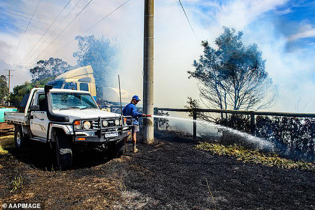 Despicable act is slammed as bushfires destroy 300 buildings in worst ...