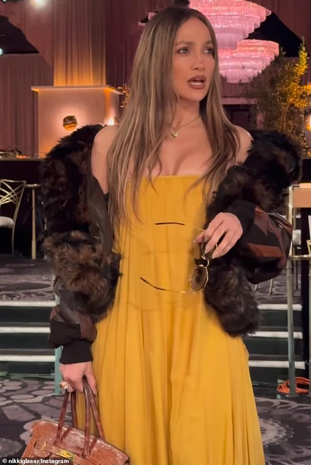 Jennifer Lopez goes full showgirl glam in racy beaded gown at pre ...