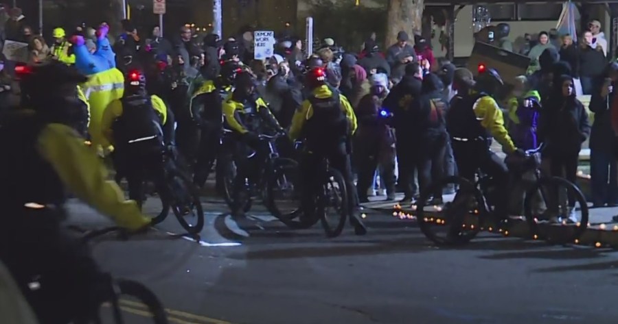 More than 100 people protest outside Portland ICE facility, two arrests ...