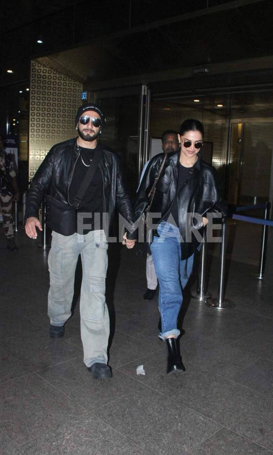 Ranveer Singh and Deepika Padukone turn heads as they arrive back in Mumbai