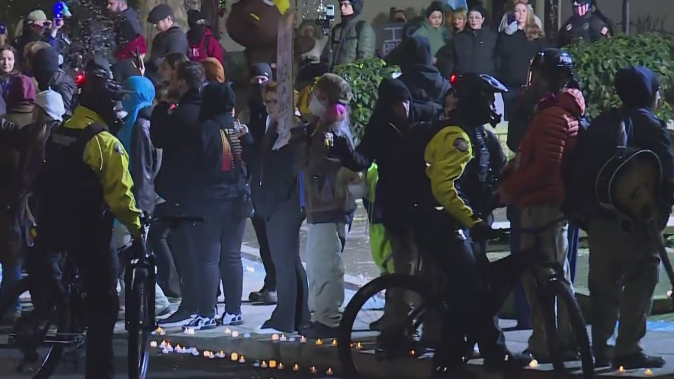 More than 100 people protest outside Portland ICE facility, several ...