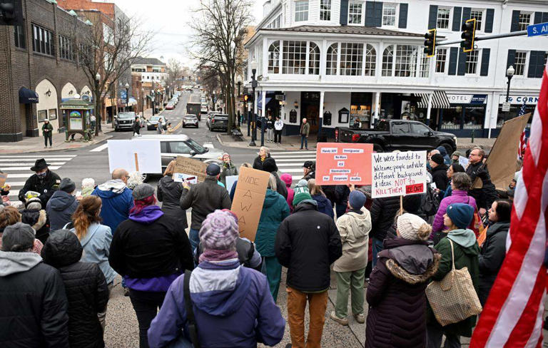 More than 200 gather to protest ICE in State College after killing of ...