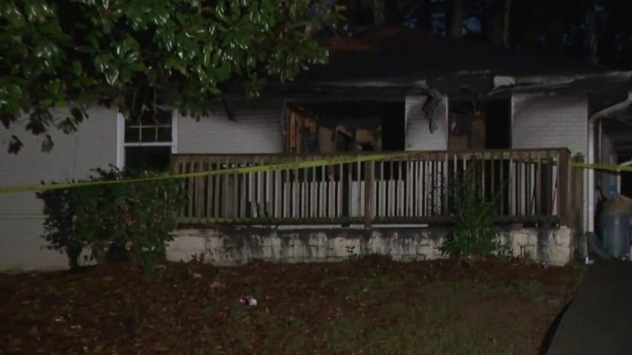 Woman's body found inside burning home