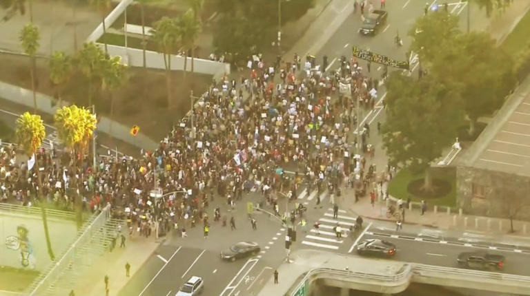 Live: Crowds protest federal immigration activity in downtown Los Angeles