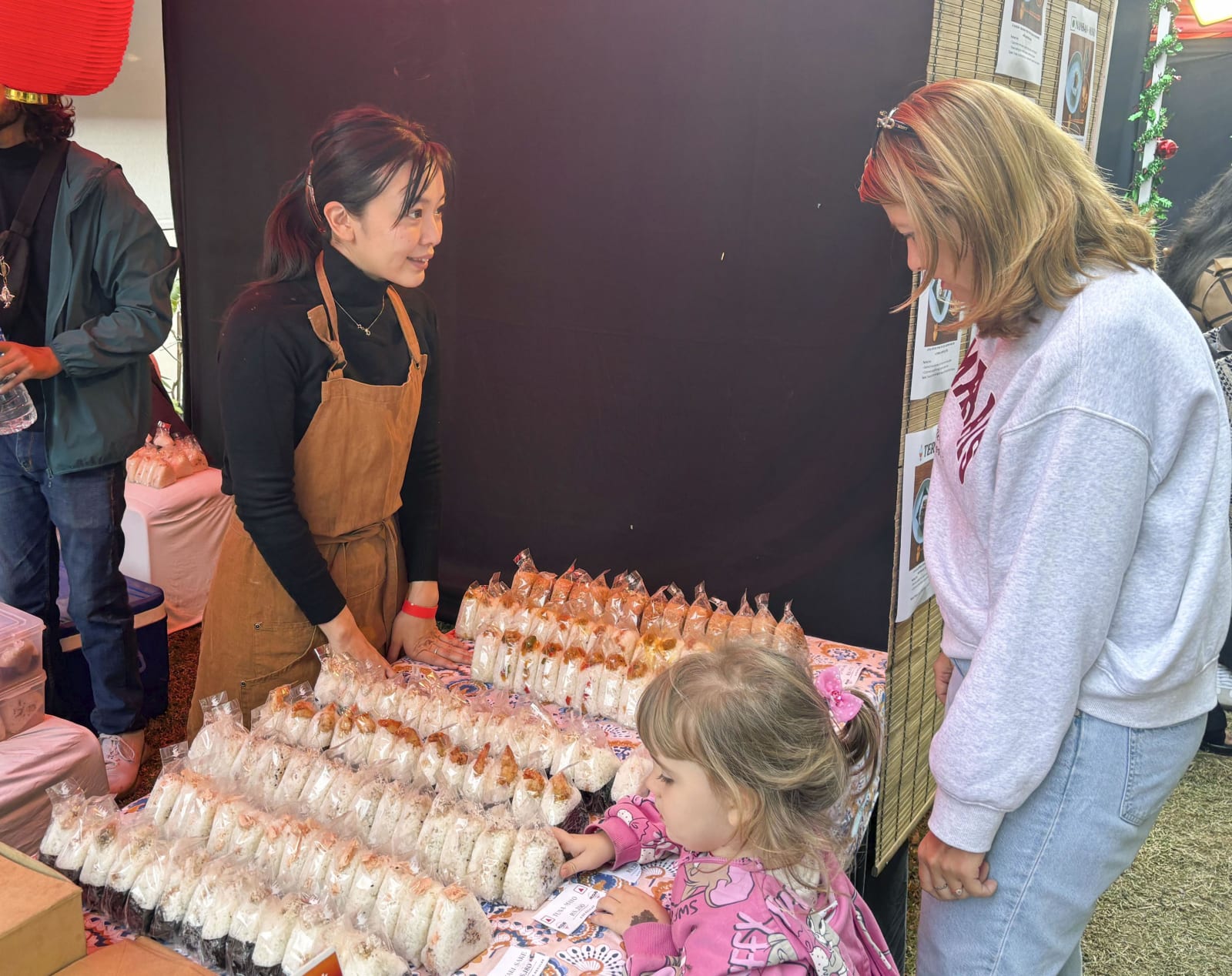 Japanese women promoting onigiri, sake in world's most populous India