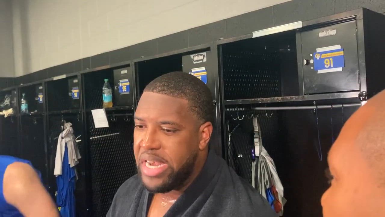 Los Angeles Rams DT Kobie Turner talks after playoff win over Panthers
