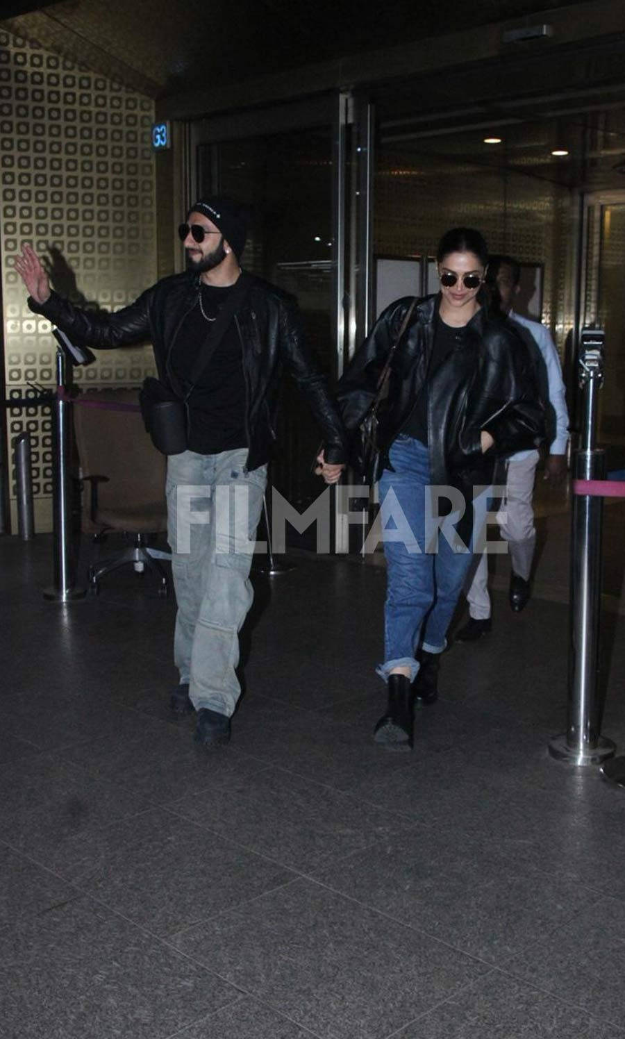 Ranveer Singh and Deepika Padukone turn heads as they arrive back in Mumbai