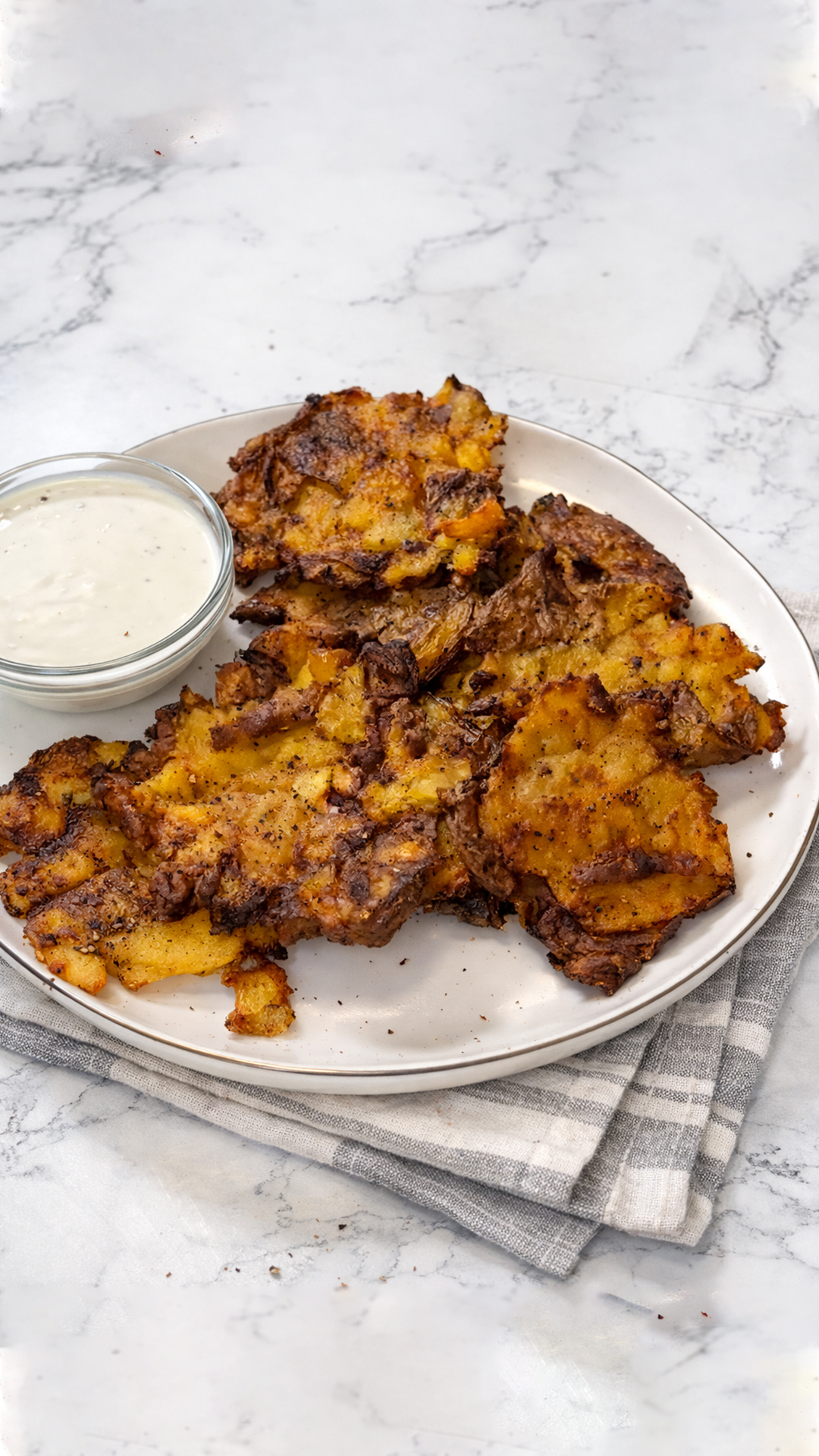 Making vegan crispy smashed potatoes at home