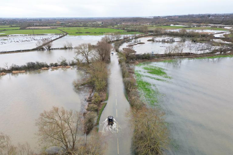 Wind and rain batter the UK as Met Office weather warnings