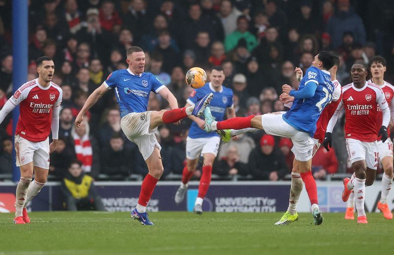 Soccer-Martinelli hat-trick sends Arsenal past Portsmouth in FA Cup ...