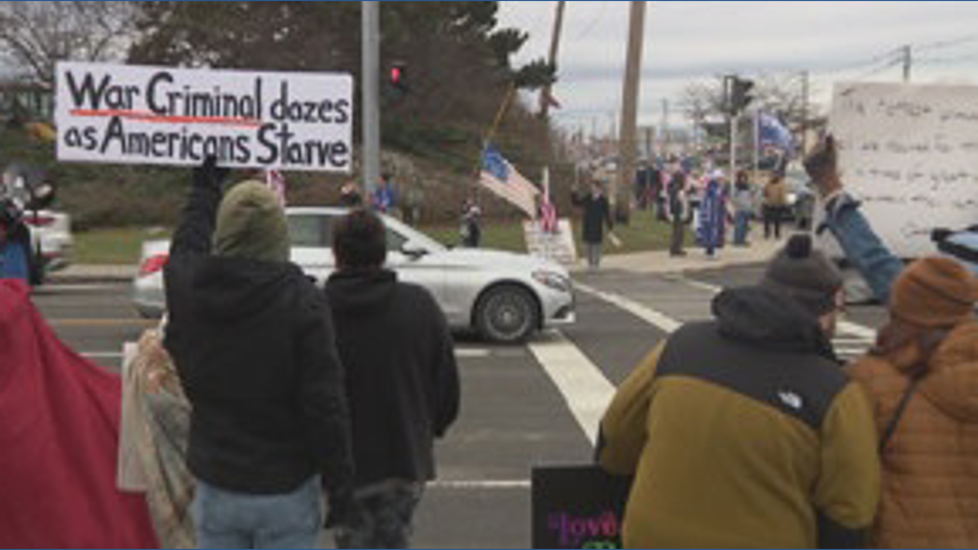 Opposing groups protest in Amherst after ICE shooting