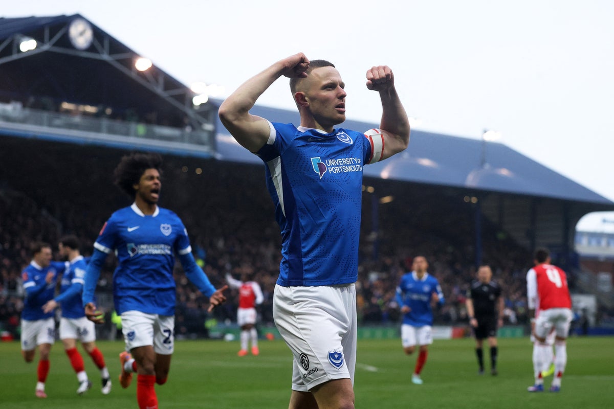 Arsenal level after Championship strugglers Portsmouth take shock lead