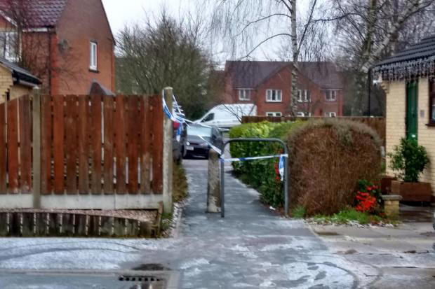 Police cordon off alleyway after serious stabbing incident