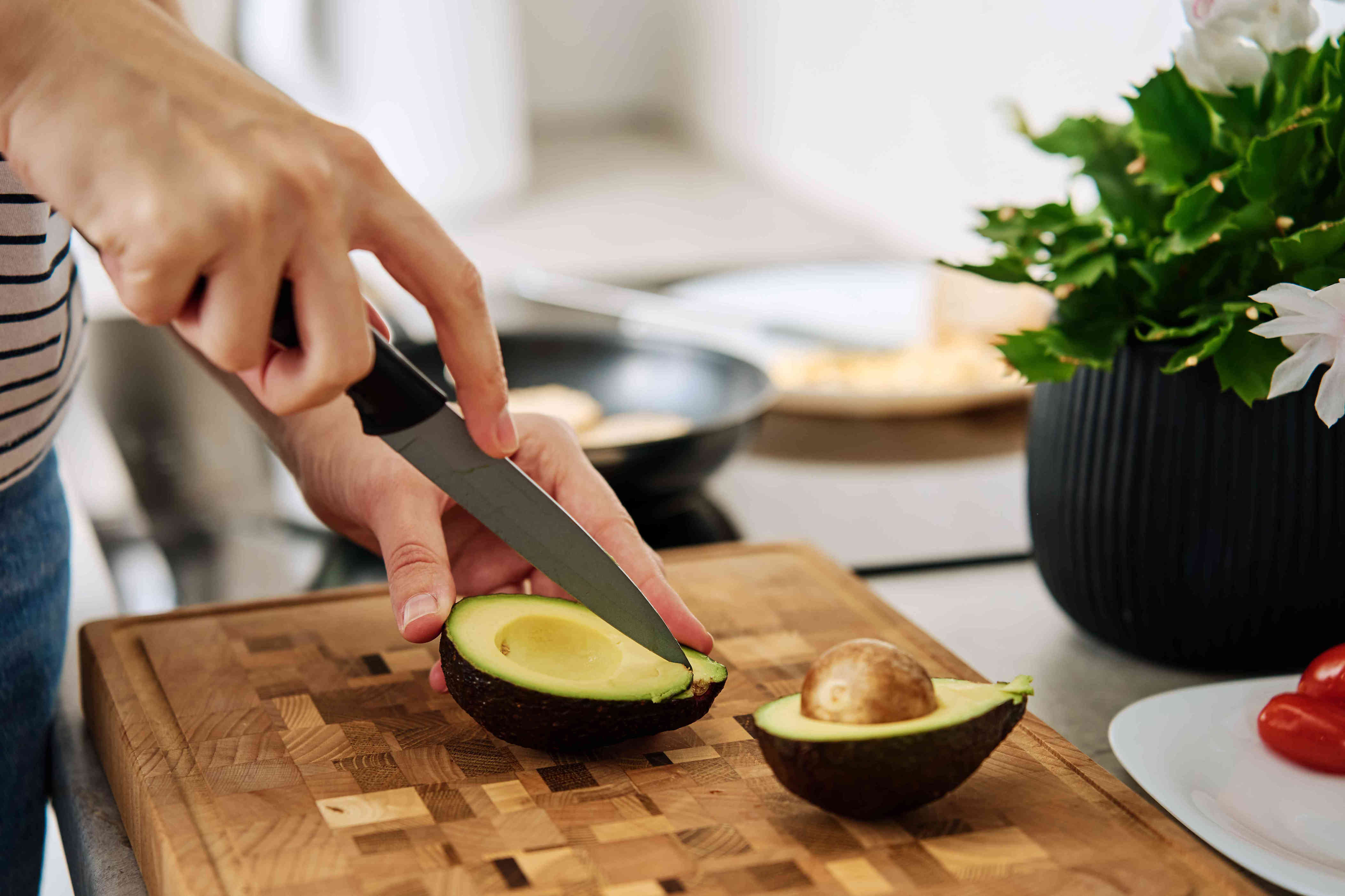 How to safely remove the pit from an avocado, according to experts