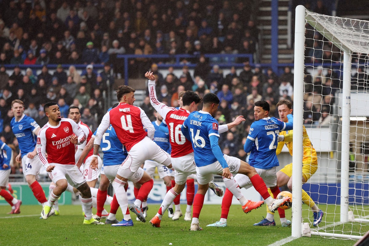 Arsenal level after Championship strugglers Portsmouth take shock lead