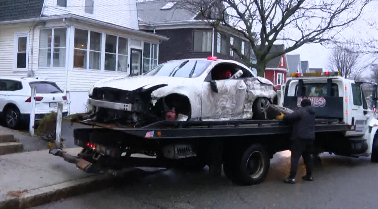 Car collides with Everett home in rollover crash