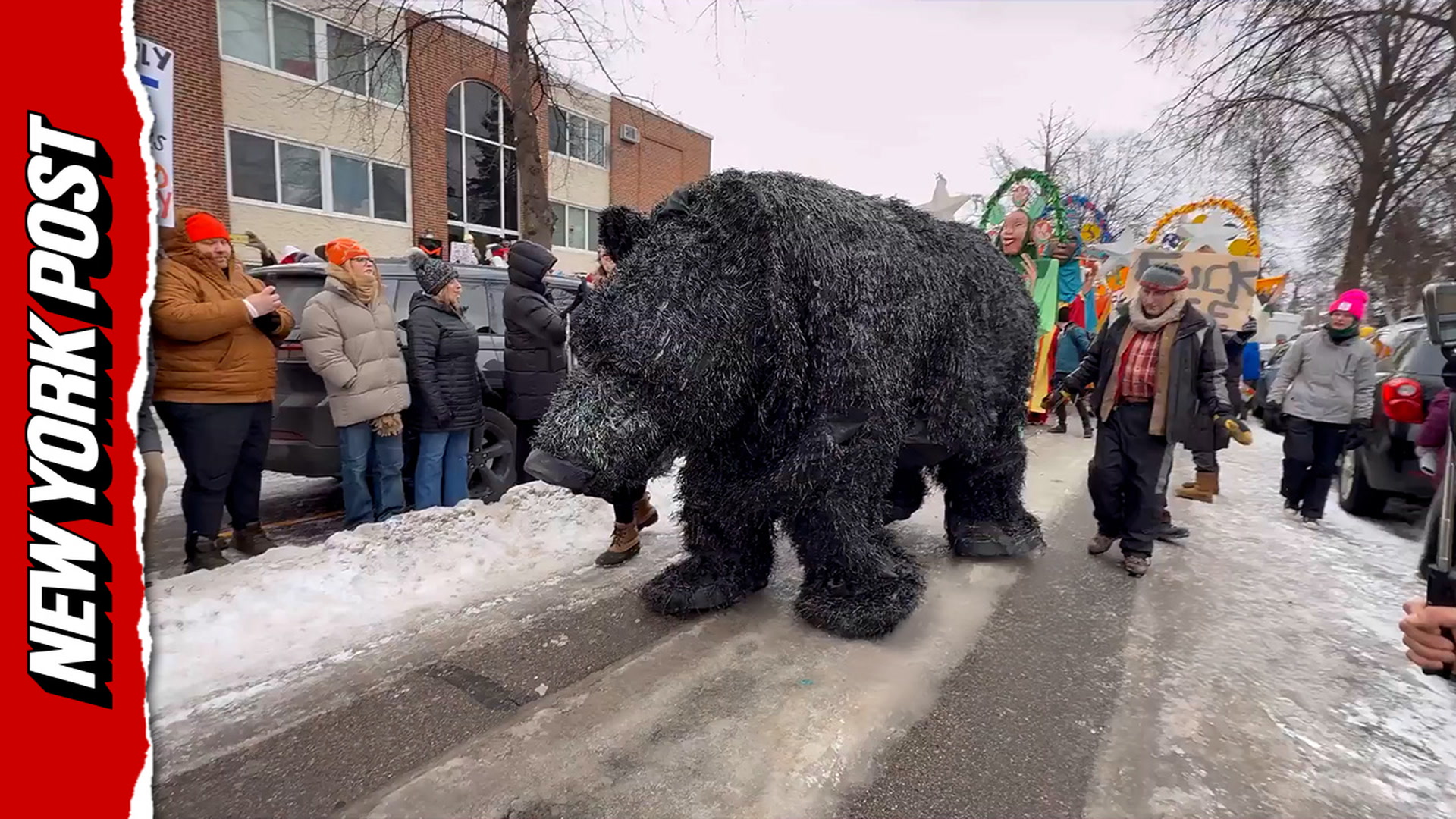 Life-size bear puppet leads Minnesota anti-ICE protest march