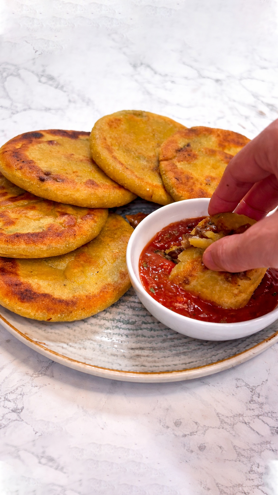 Making vegan pupusas with black beans and veggies