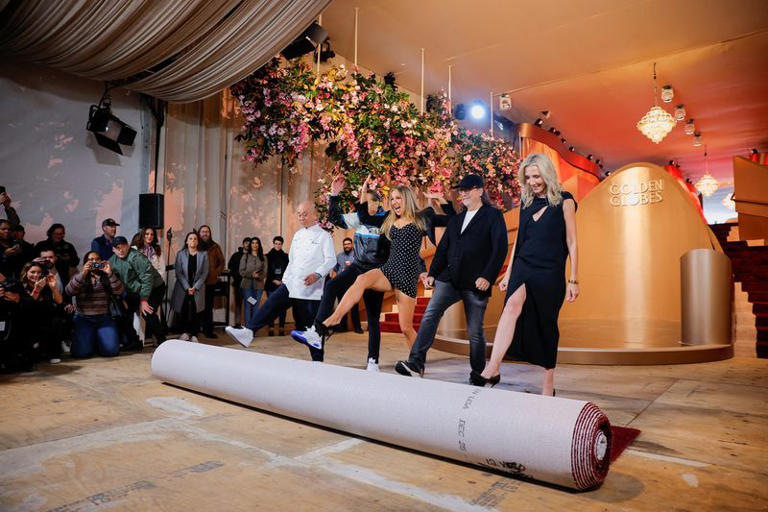 Taylor, Skarsgard honored at Hollywood's Golden Globes