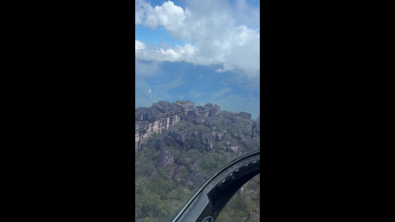 Aerial view reveals the towering beauty of Angel Falls in Bolívar ...