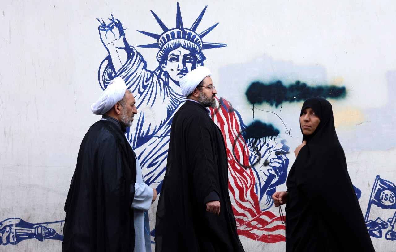 Iran warns it could hit US bases as Trump weighs military options