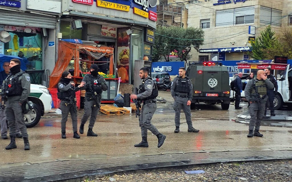 East Jerusalem man arrested after police officer lightly injured in hit ...