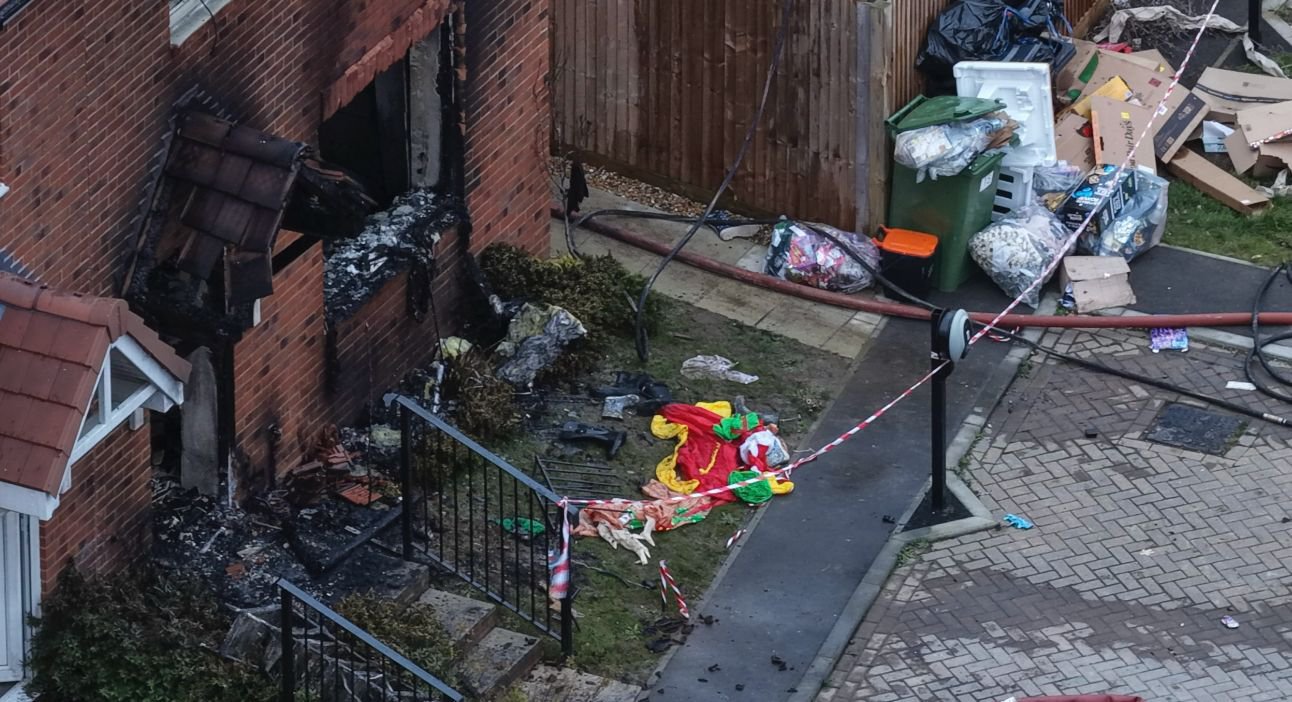 Neighbours battle to put out fire engulfing home