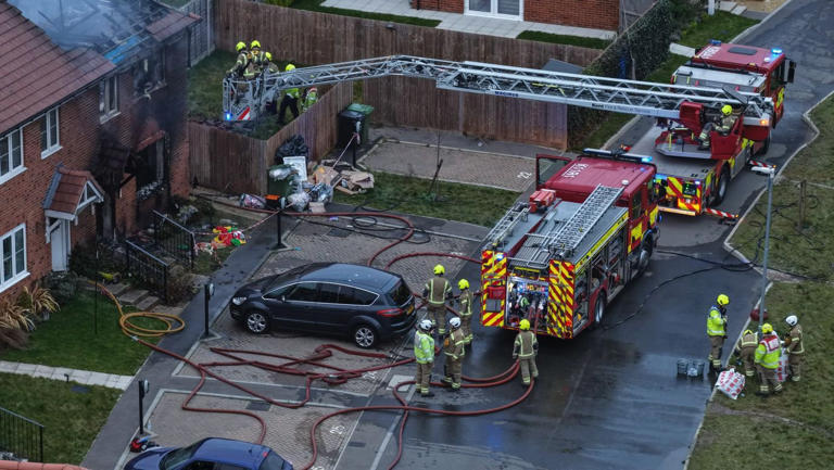 Neighbours battle to put out fire engulfing home