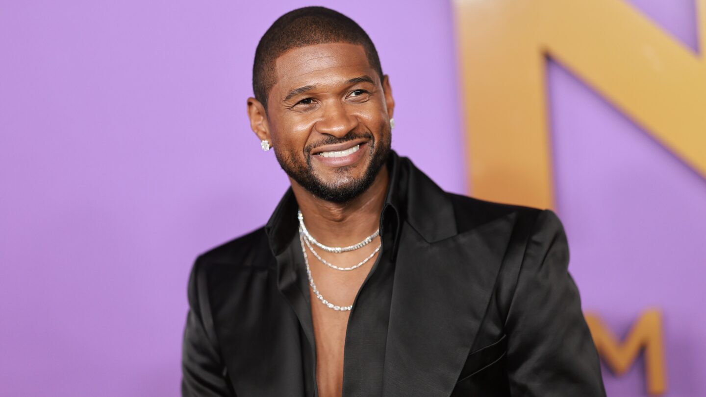 Usher opens up about family traditions, passion for playing Spades, and ...