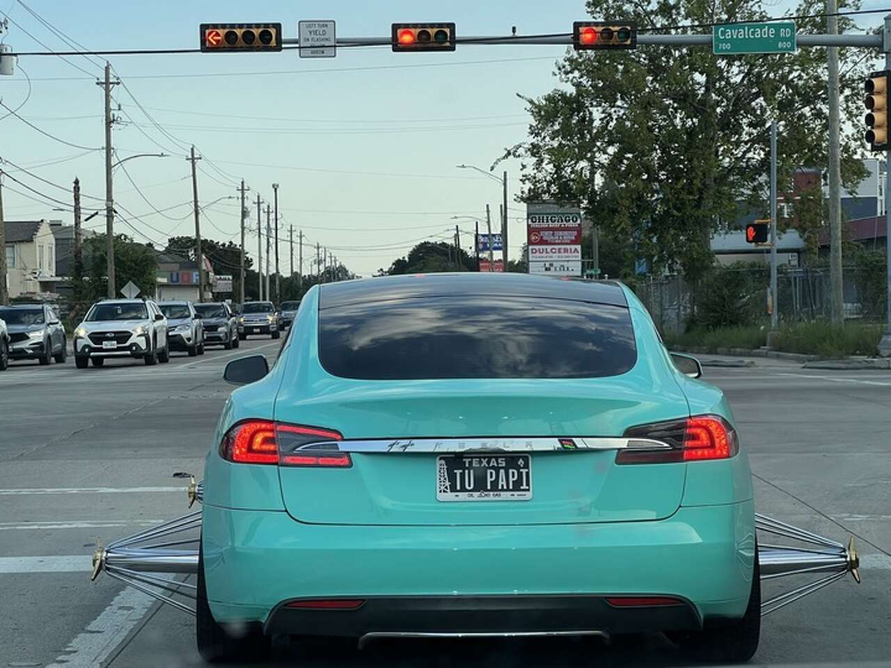 Why Houston's Tesla drivers put oil, gas and coal on their license plates