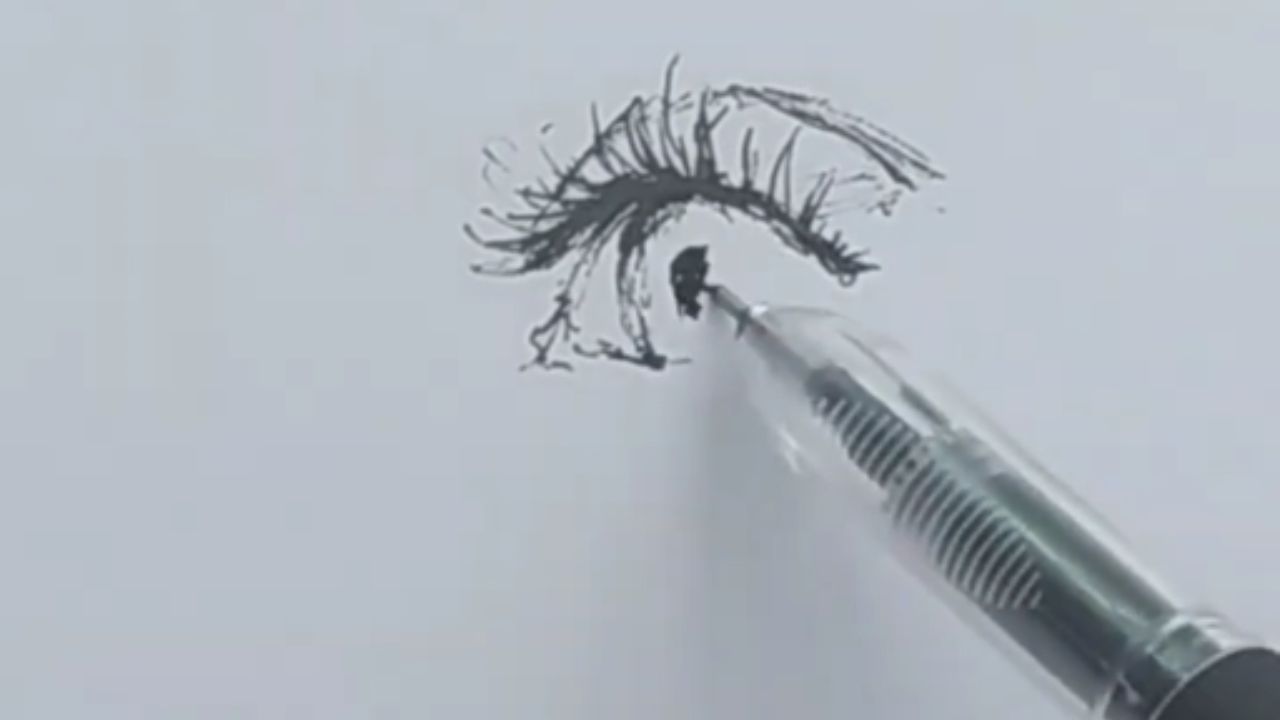 Artist uses ink to perfectly draw female face features in her graphic style