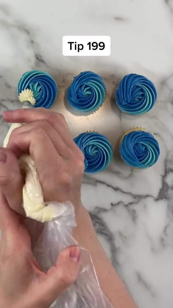 How I pipe blue cupcake swirls with tip 828