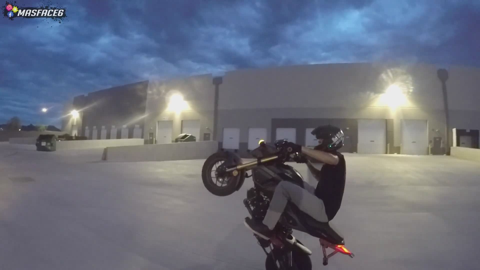 Legs-spread wheelie variation adds flair to basic stunt