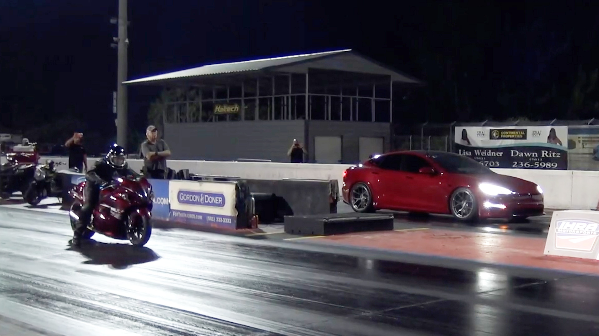 Electric sedan takes on a street bike Tesla vs Hayabusa