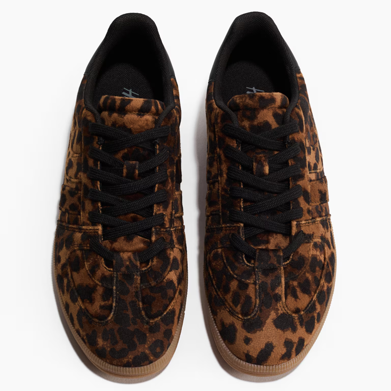 H&M just released a pair of leopard print trainers, and they remind me ...