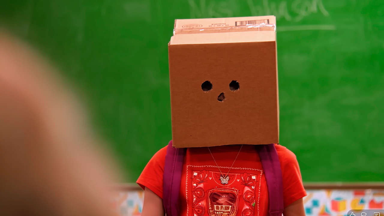 Girl won't show face in school