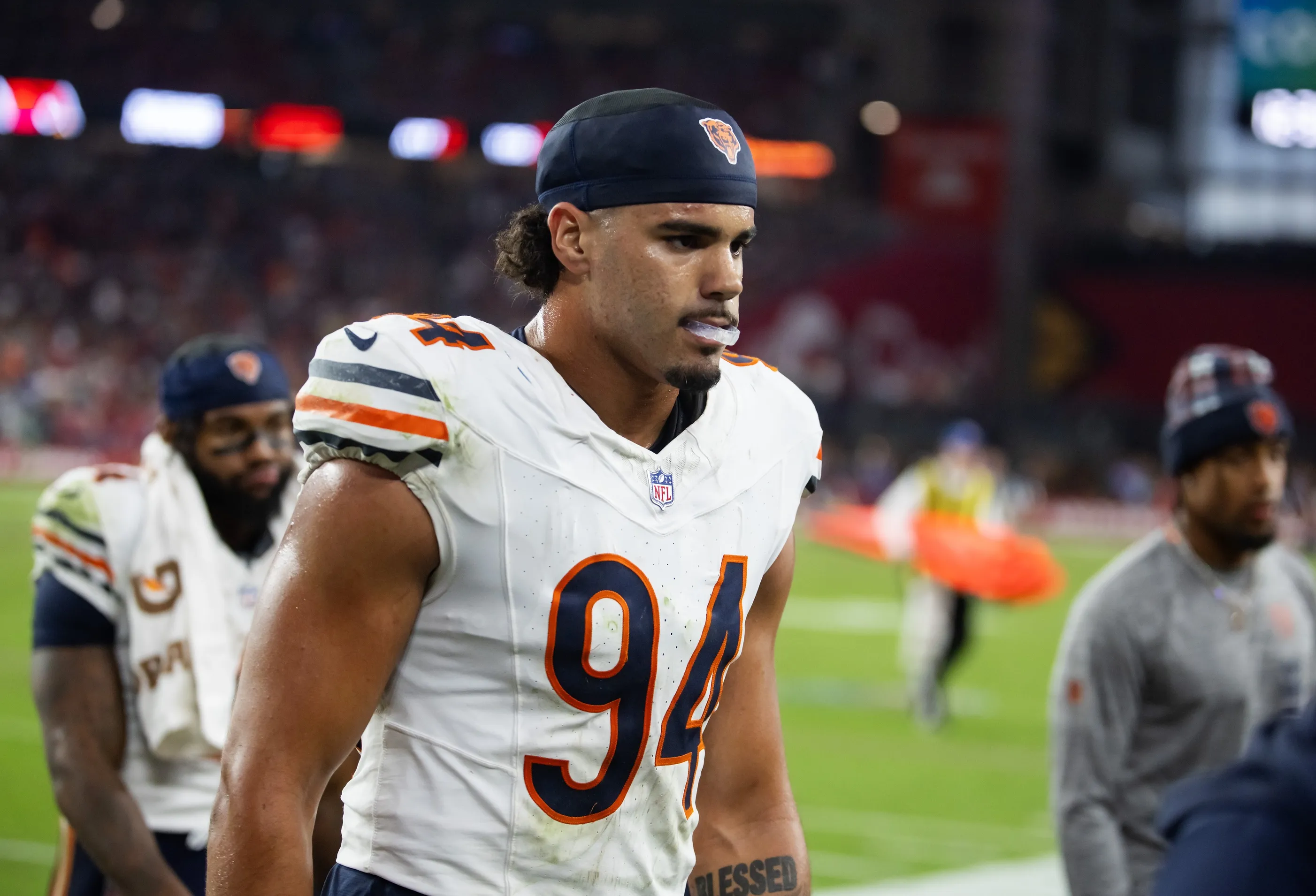 NFL fines Bears’ Austin Booker for two hits on Jordan Love in heated ...