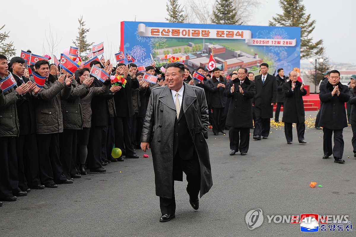 N Korea's Kim attends opening of new paper mill