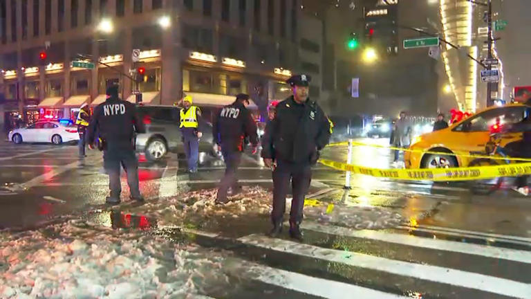 Gunfire erupts blocks from Rockefeller Center and bustling holiday crowds