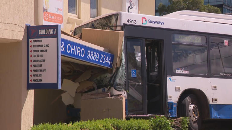 Bus driver survives crash after colliding with car in Sydney's north-west