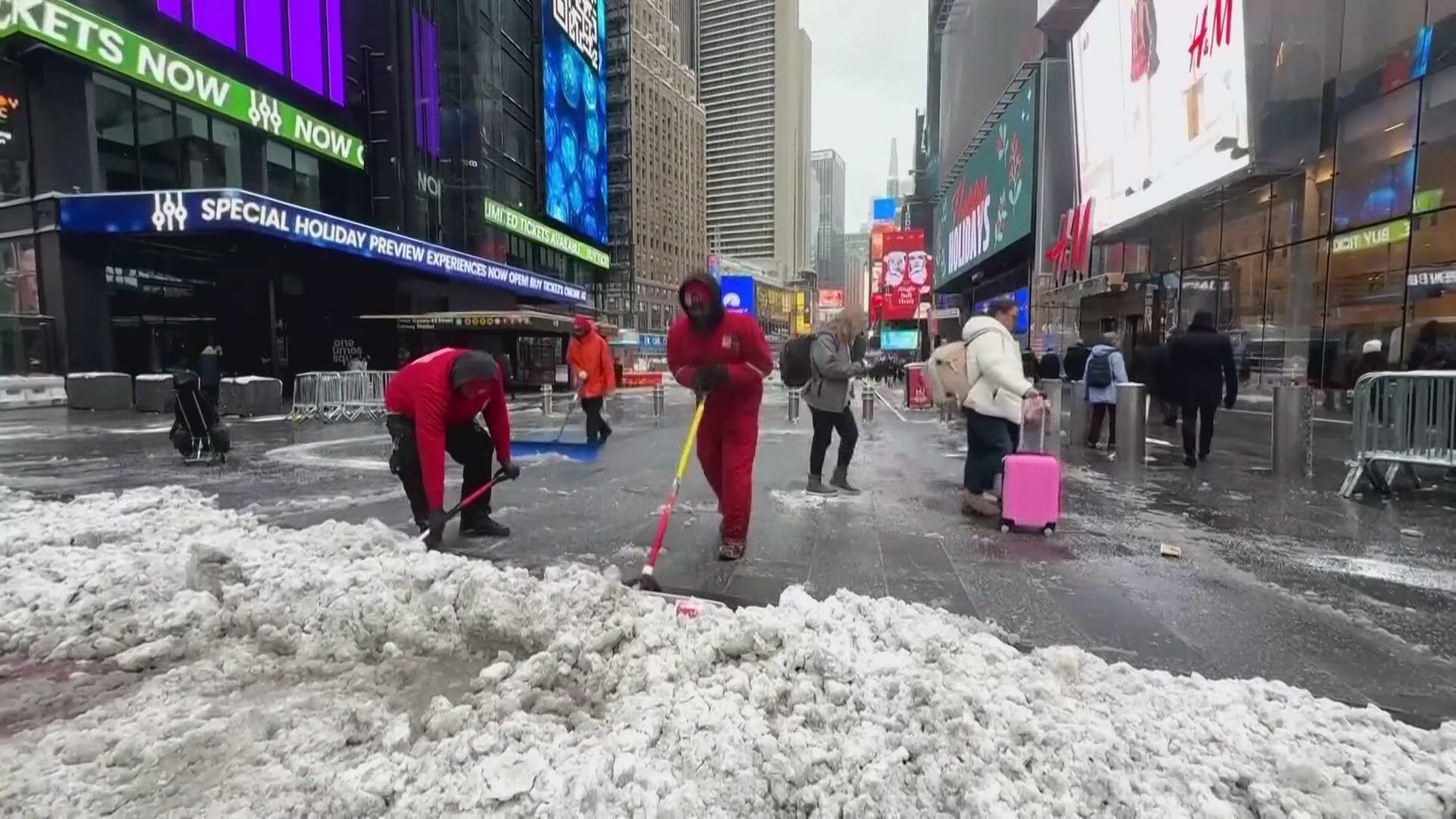 Hundreds of flights canceled as piles of snow blanketed Northeast