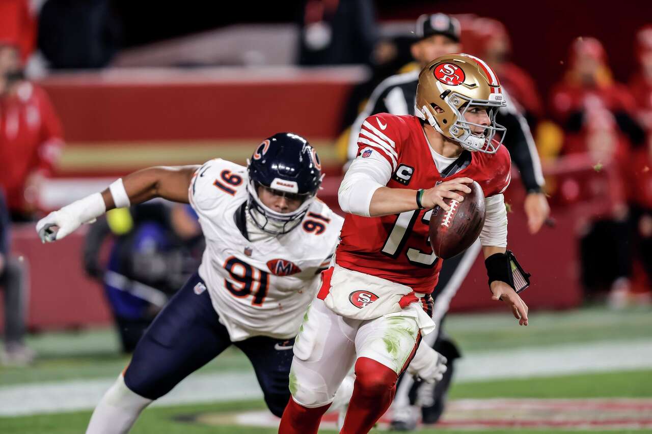 49ers win frenzied fracas, beat Bears 42-38 to set up NFC showdown with ...