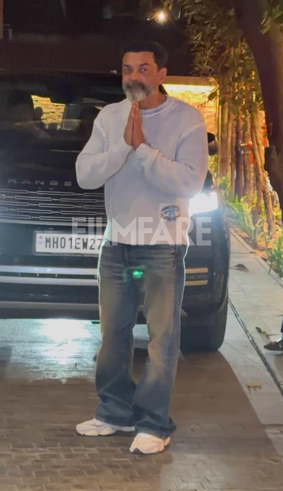 Photos: Bobby Deol interacts with paparazzi as he arrives with family ...