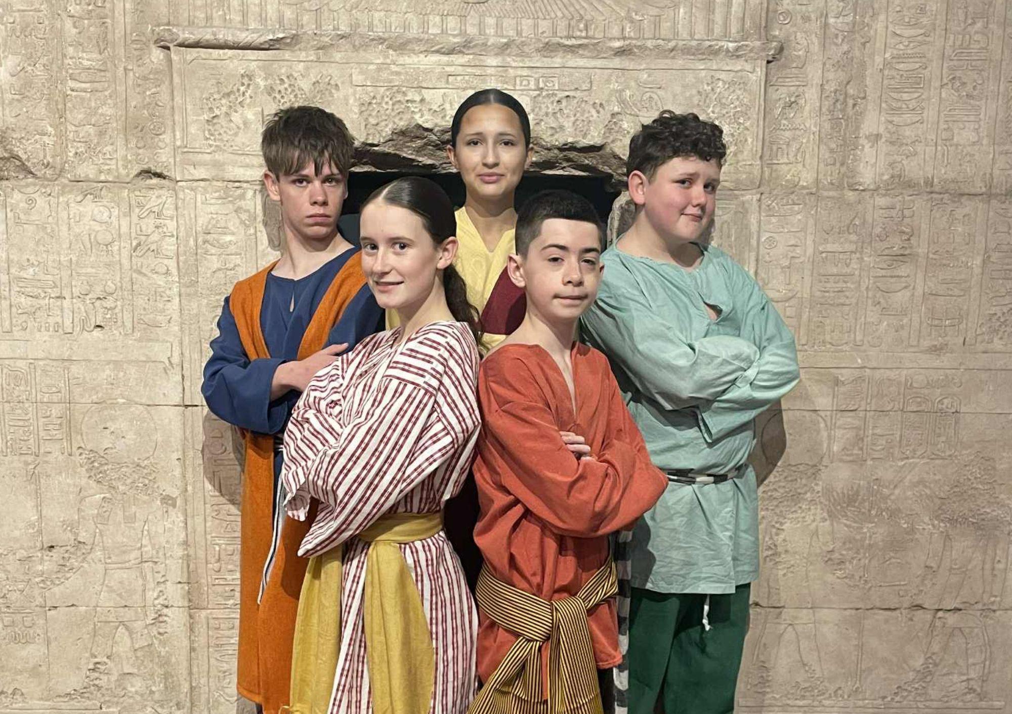 Young performers strike a pose in museum’s Egypt gallery for Joseph musical