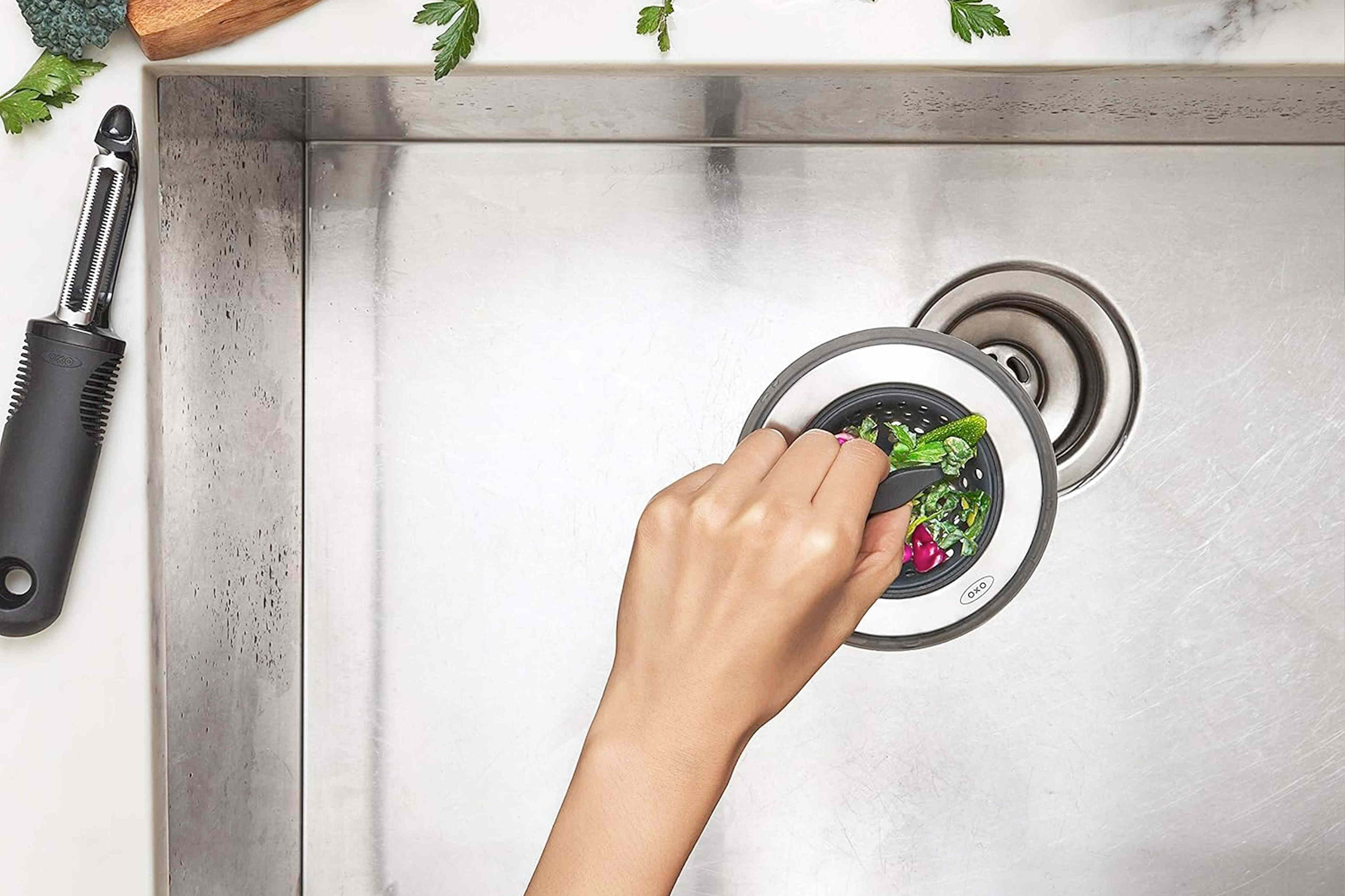 Say goodbye to stinky kitchen sinks: This 2-in-1 OXO tool stops gross ...