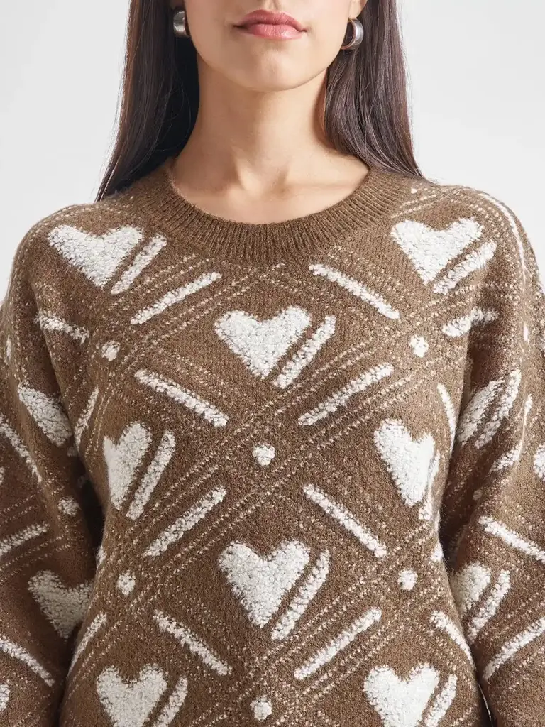 Warm and stylish women sweaters for winter comfort on Myntra